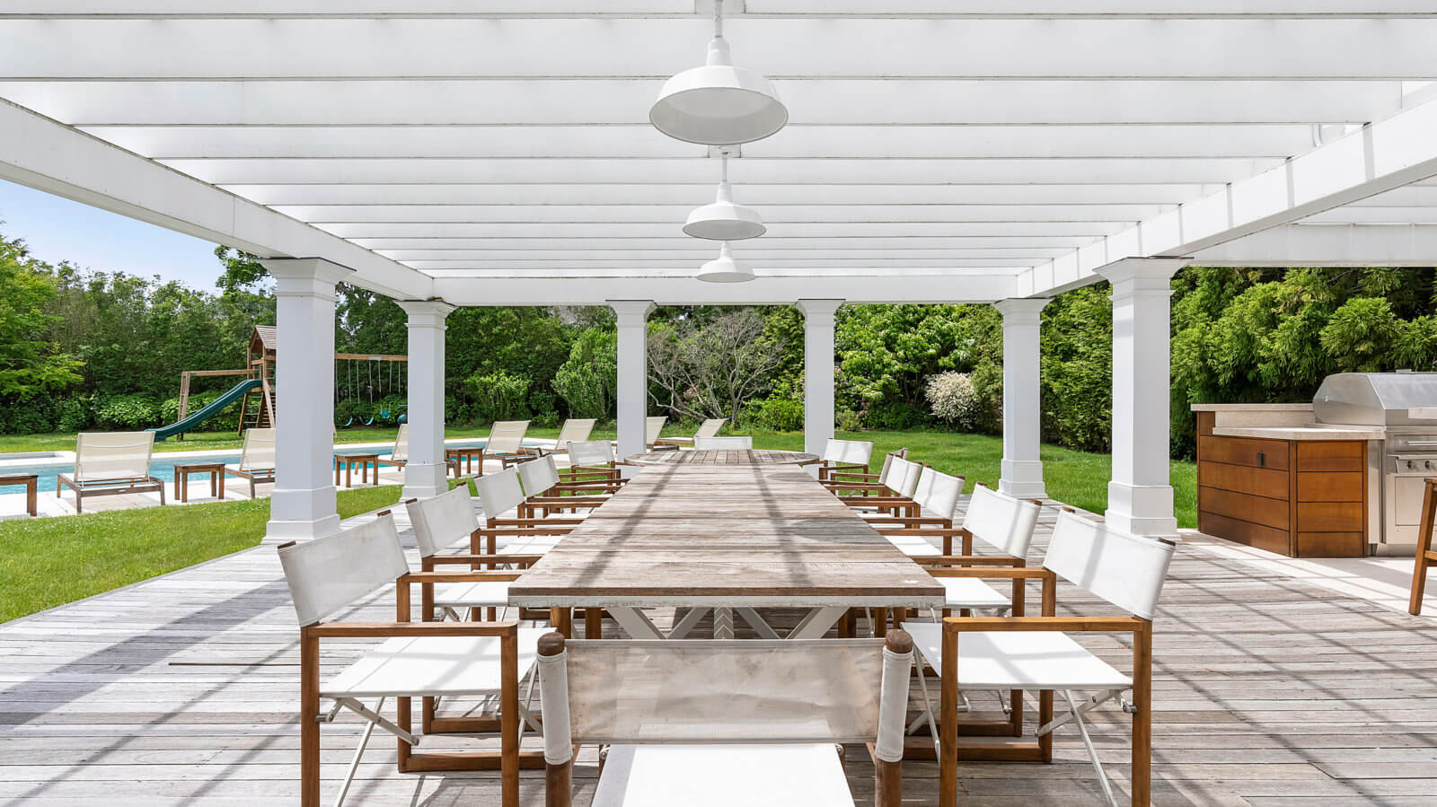 Hamptons Home Boasts Enviable Outdoor Kitchen, Dining Area
