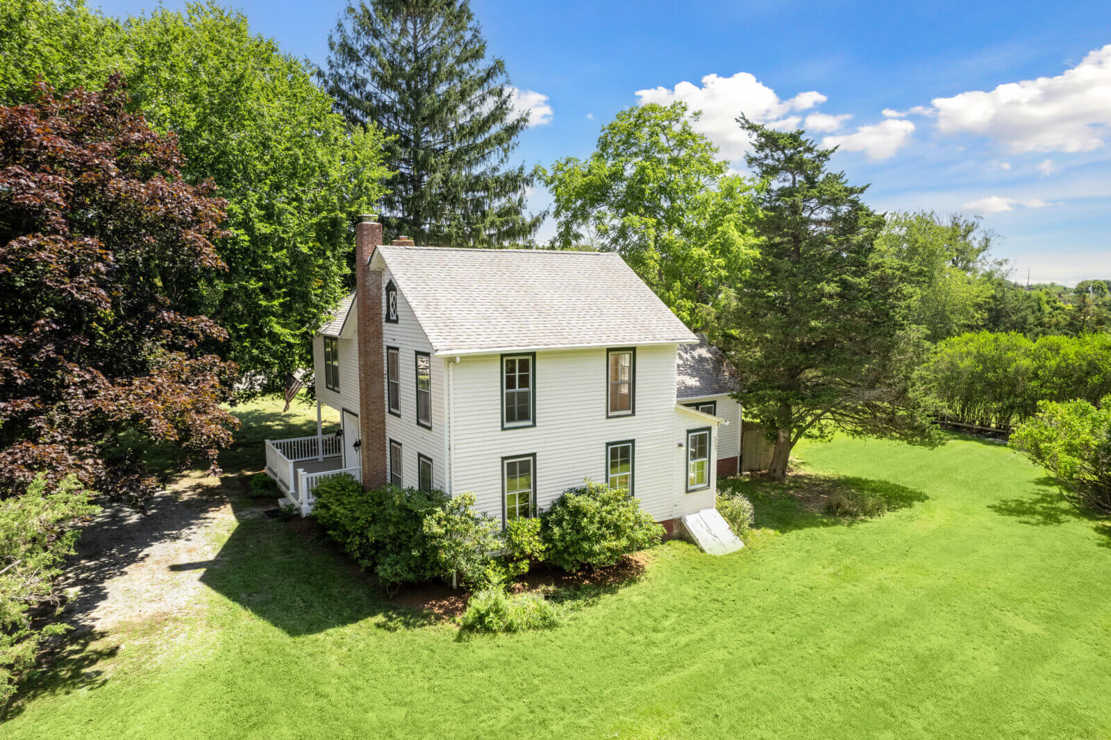 East Moriches Landmark Property With Farmhouse and Legacy Barn For Sale