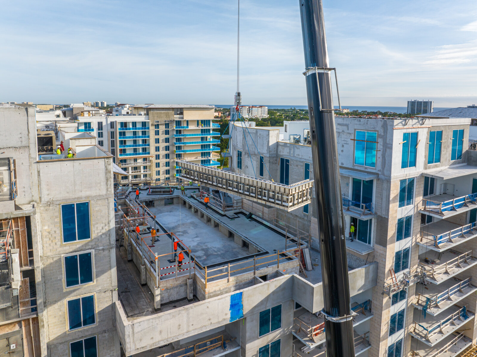 Crane Flies in Pool for Boca Raton’s ALINA Residences